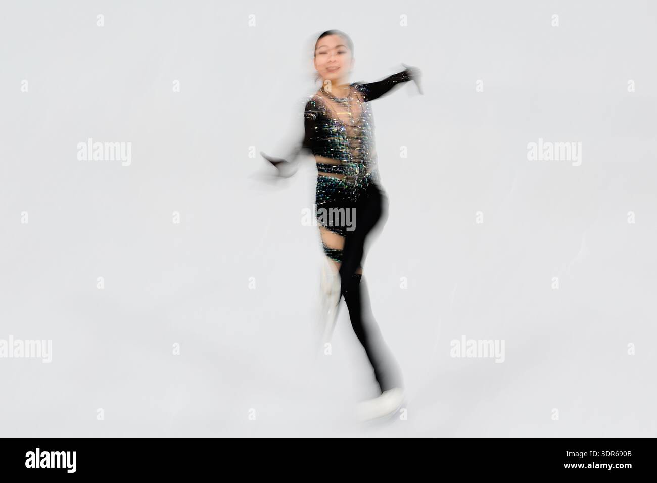Zhang Ruiyang of China competes during the women's short program figure ...