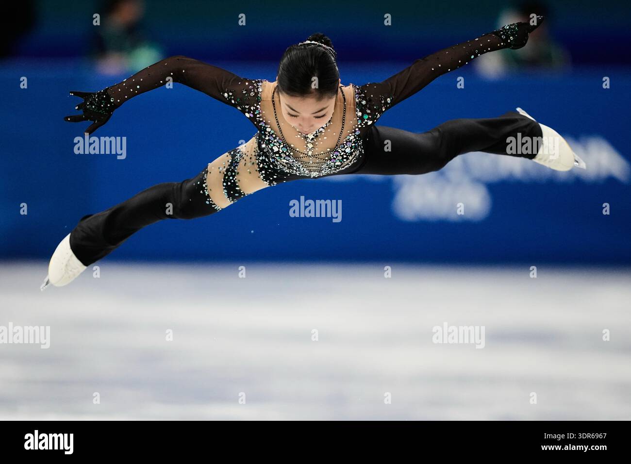Zhang Ruiyang of China competes during the women's short program figure ...