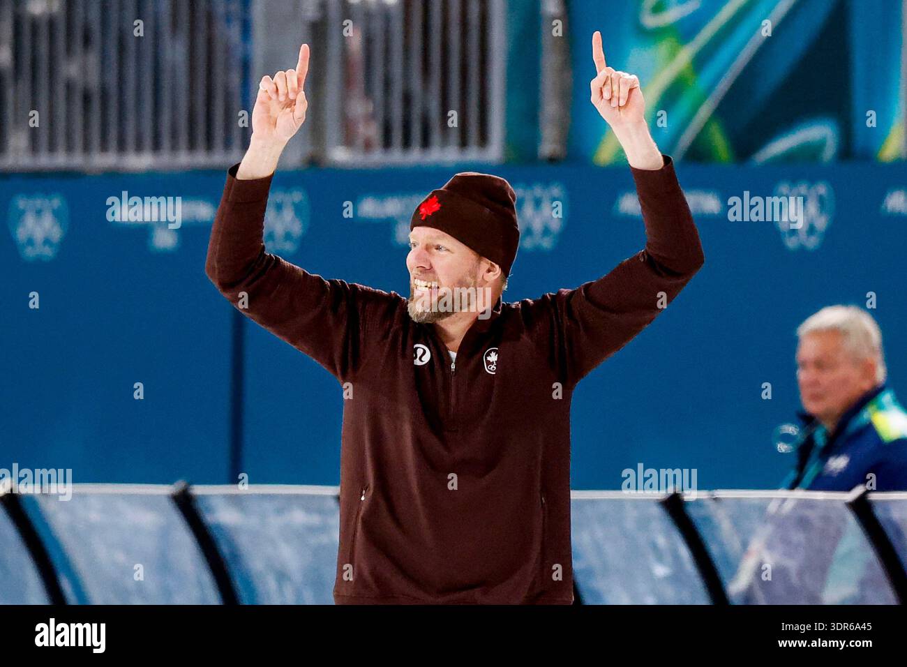 coach Remmelt Eldering of Canada celebrates after watching atheletes ...