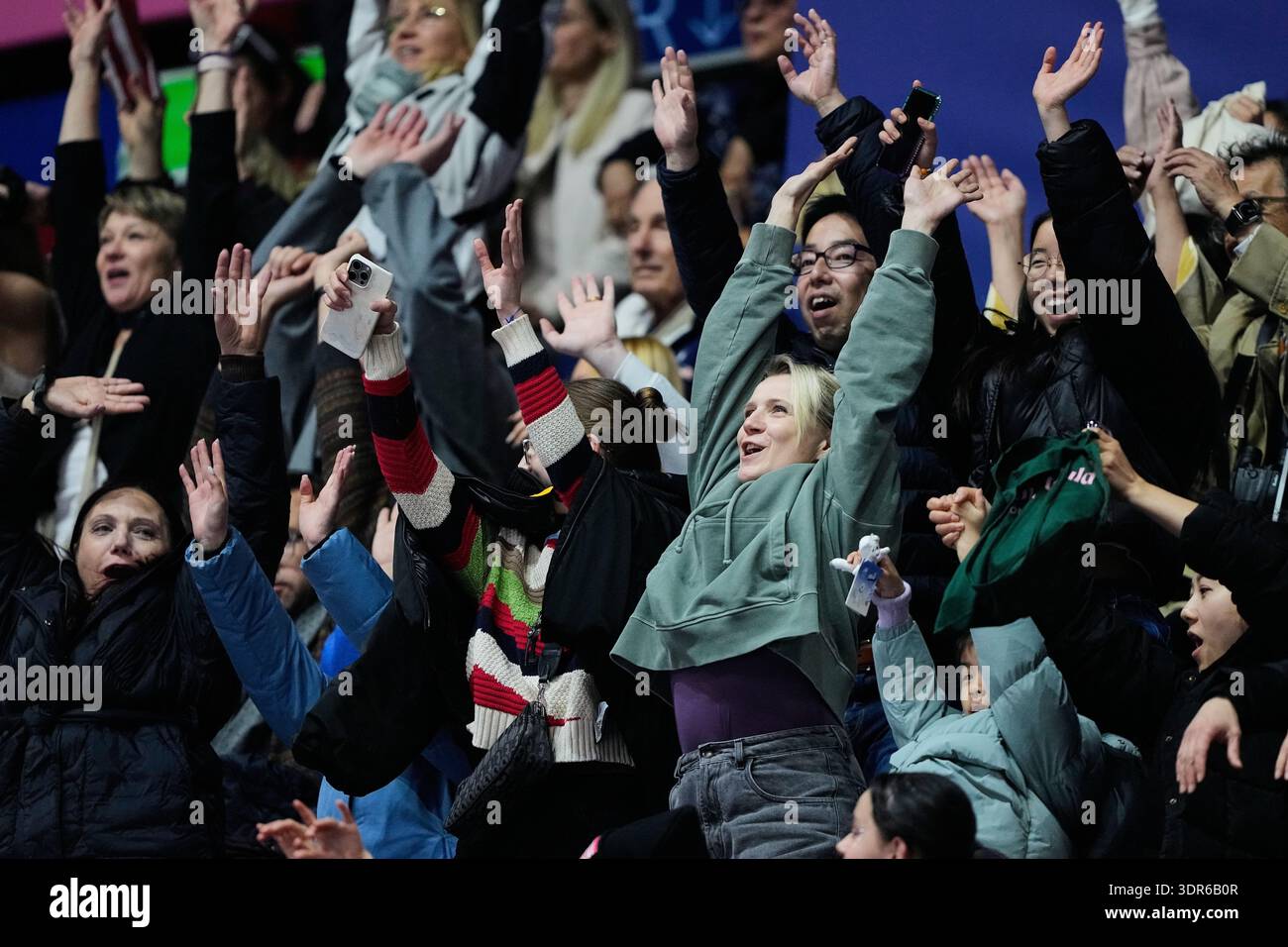 Fans cheer during the women's short program figure skating at the 2026 ...
