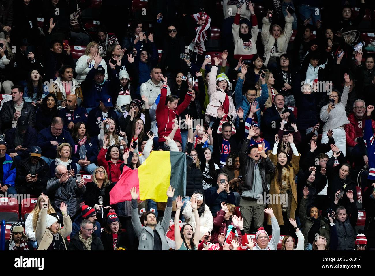 Fans cheer during the women's short program figure skating at the 2026 ...