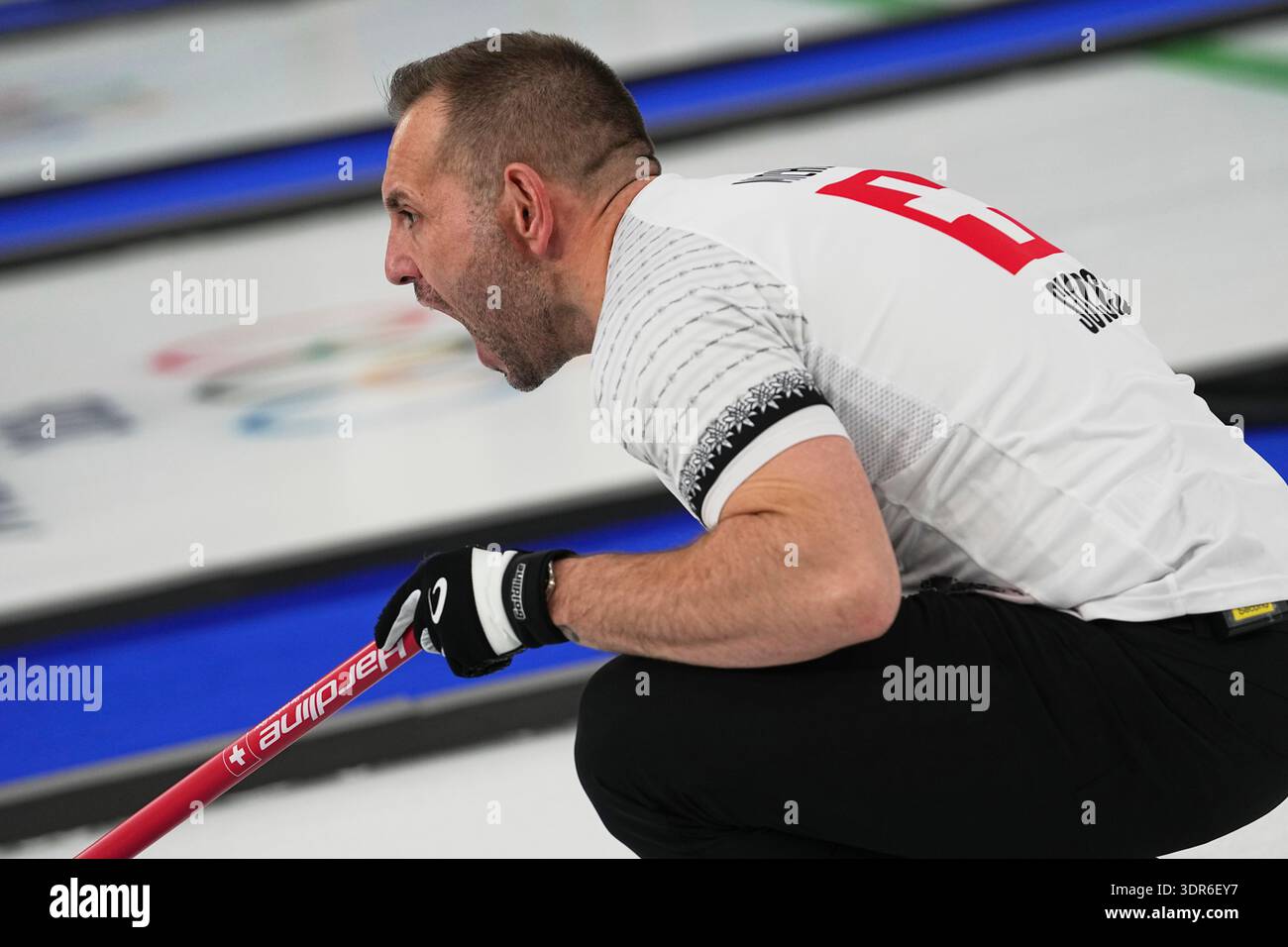 Switzerland's Sven Michel in action during the men's curling round ...