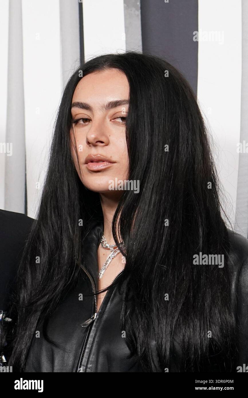 Charli xcx poses for photographers upon arrival at the premiere for the ...