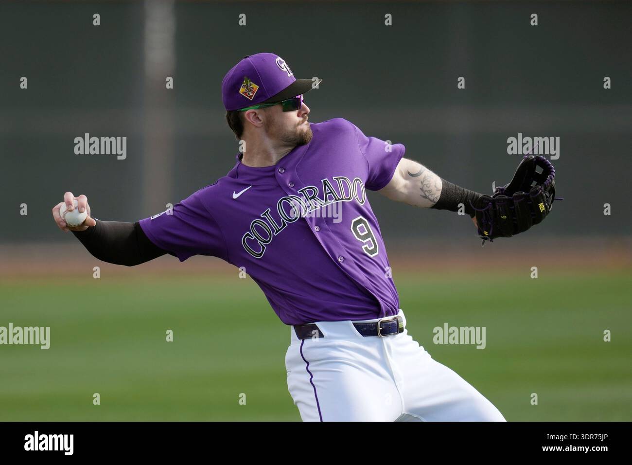 Colorado Rockies' Brenton Doyle works out during spring training ...