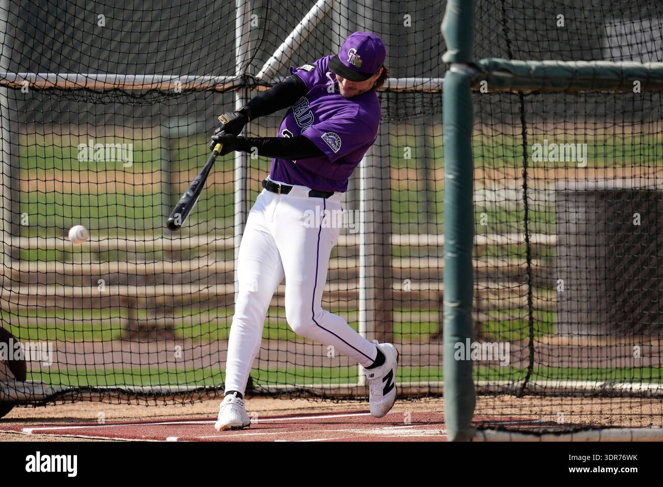 Colorado Rockies' Jake McCarthy works out during spring training ...