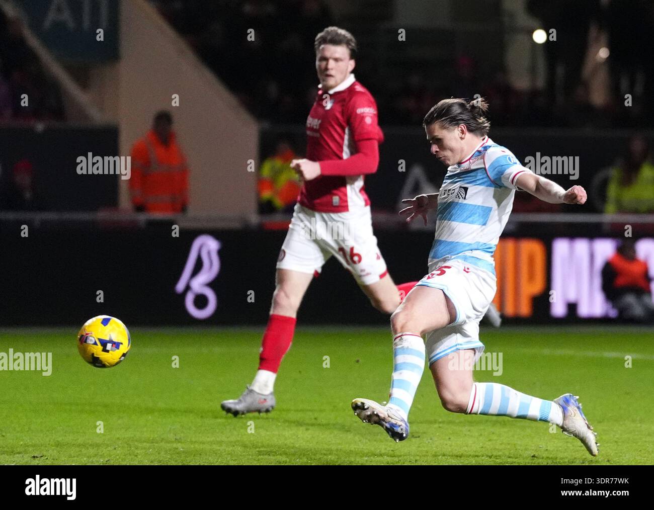 Wrexham's George Dobson (right) attempts a shot on goal during the Sky ...