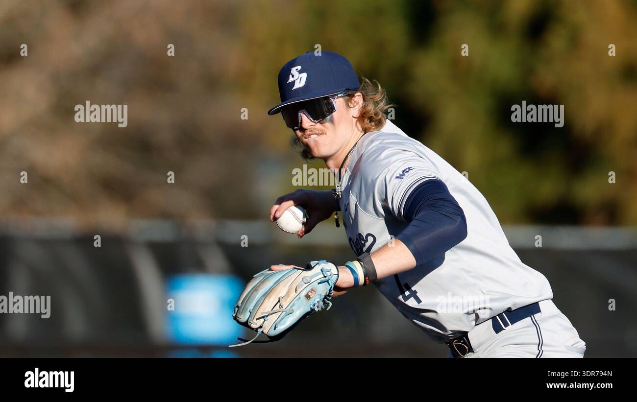 San Diego infielder Gabe Springer throws during an NCAA baseball game ...