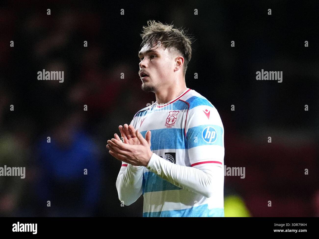 Wrexham's Callum Doyle applauds the fans following the Sky Bet ...