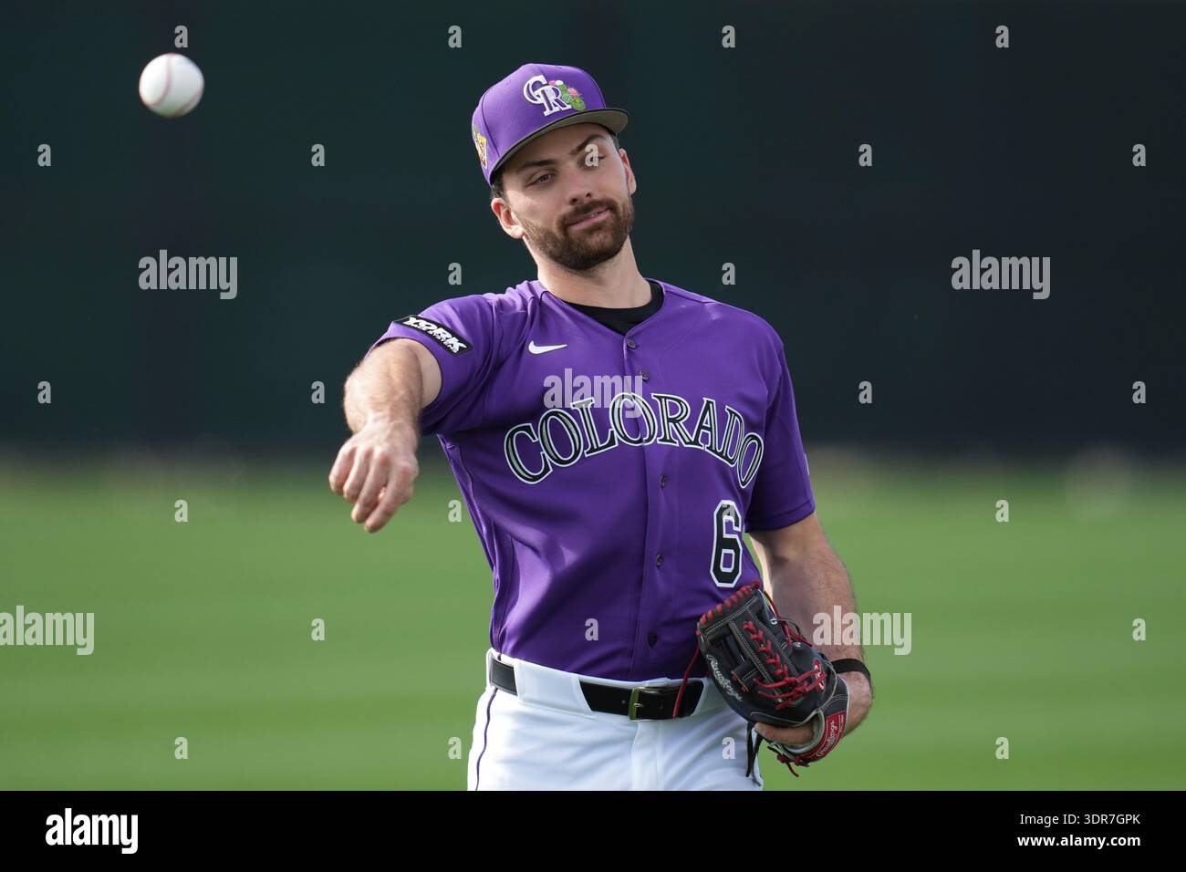 Colorado Rockies' Edouard Julien works out during spring training ...