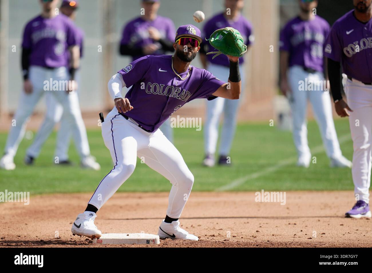 Colorado Rockies' Willi Castro works out during spring training ...