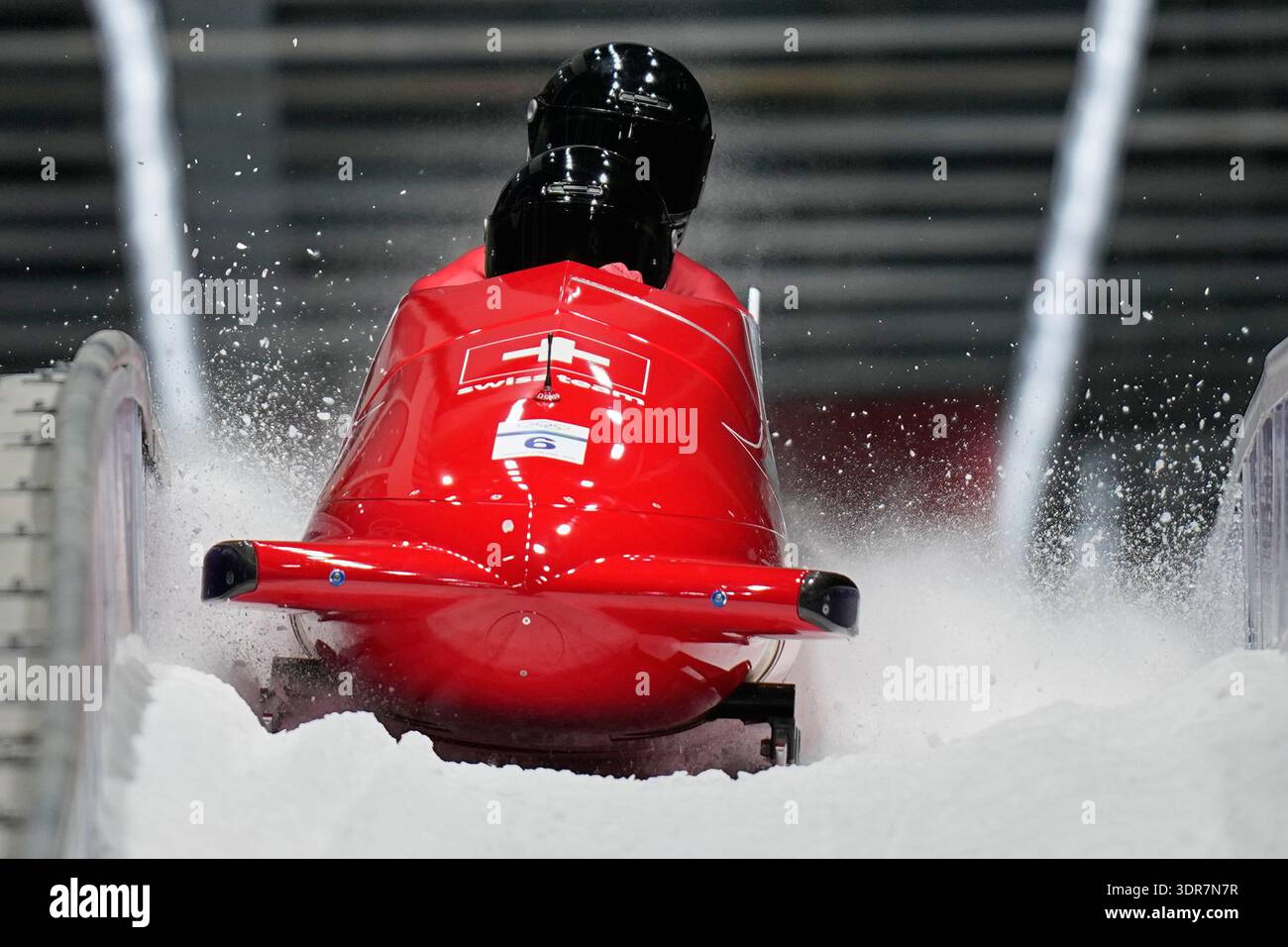 Switzerland's Michael Vogt and Amadou David Ndiaye arrive at the finish ...