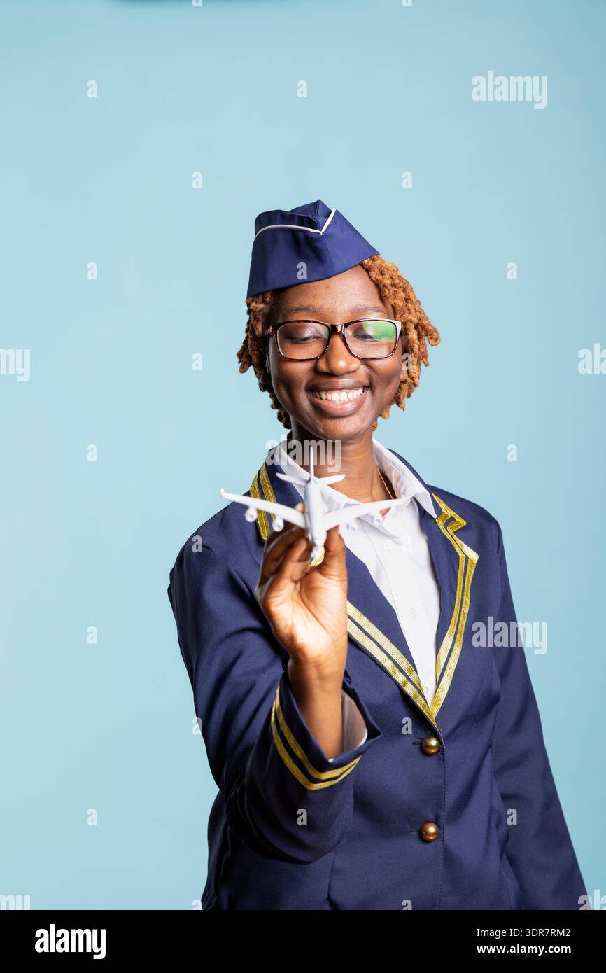 Elegant cabin crew in hi-res stock photography and images - Alamy