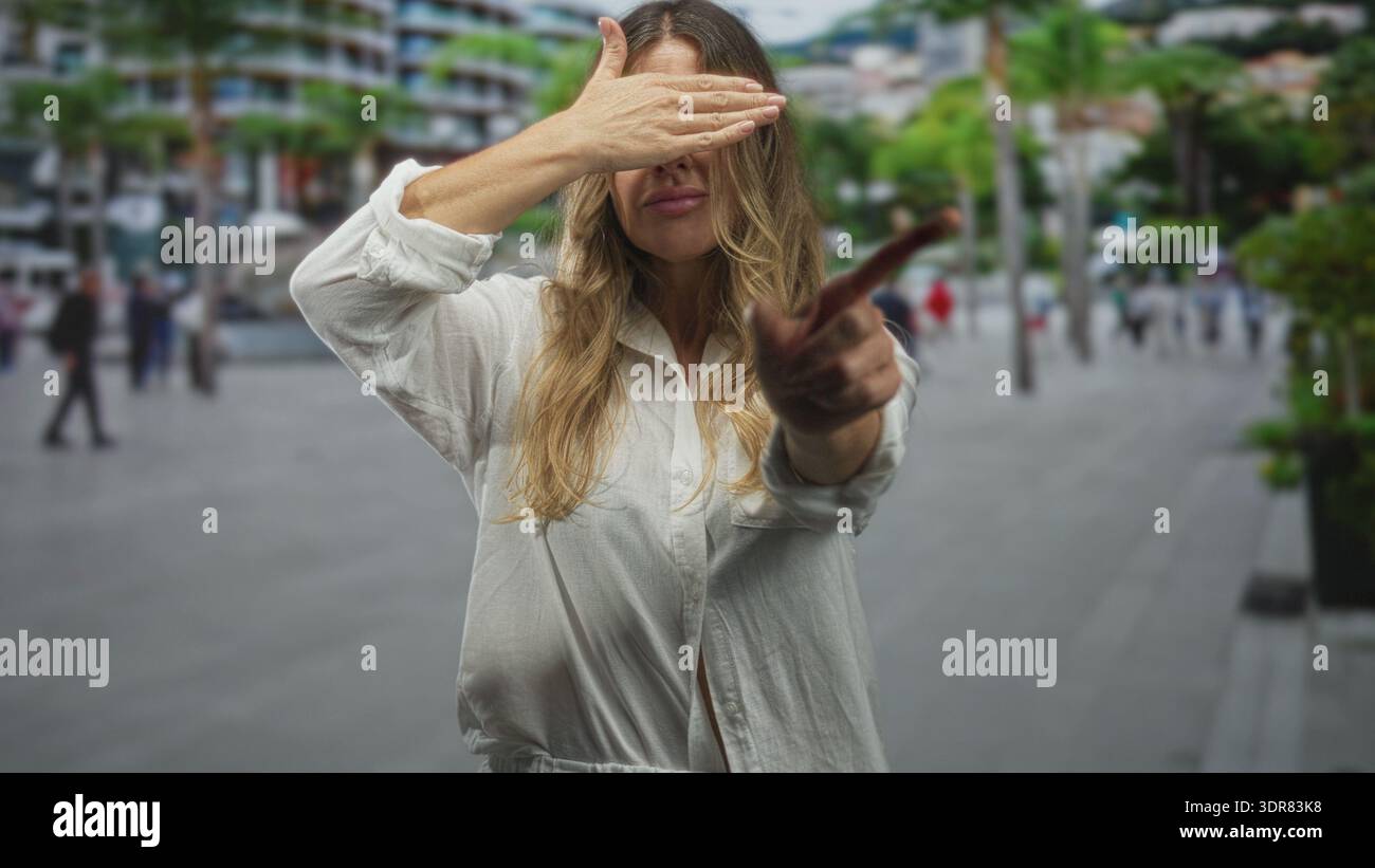 Woman palms forward blocking hi-res stock photography and images - Alamy