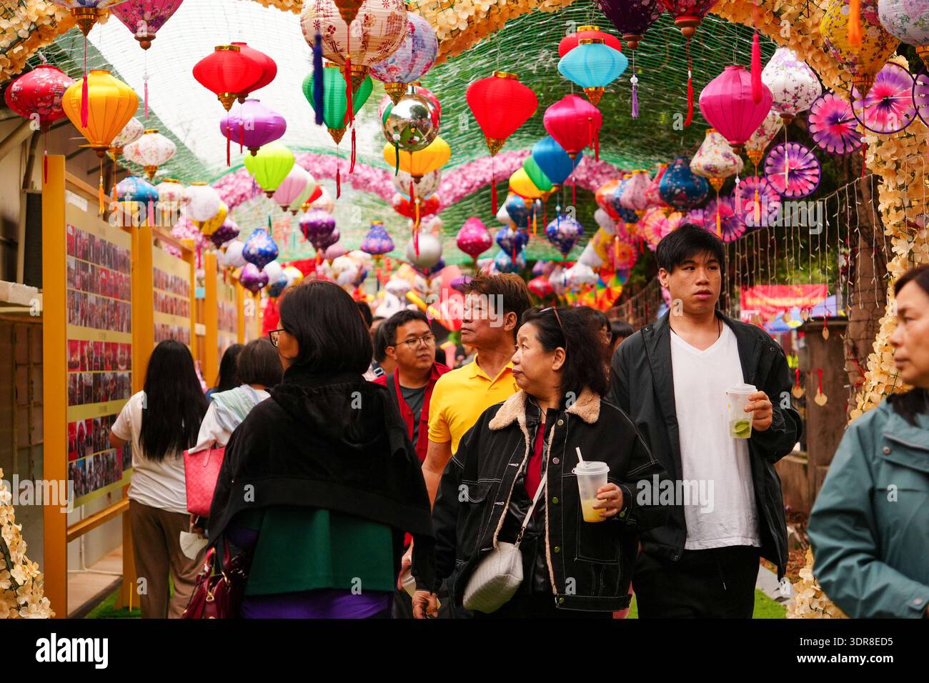 Believers looking at exhibits outside of a temple on February 17, 2026 ...