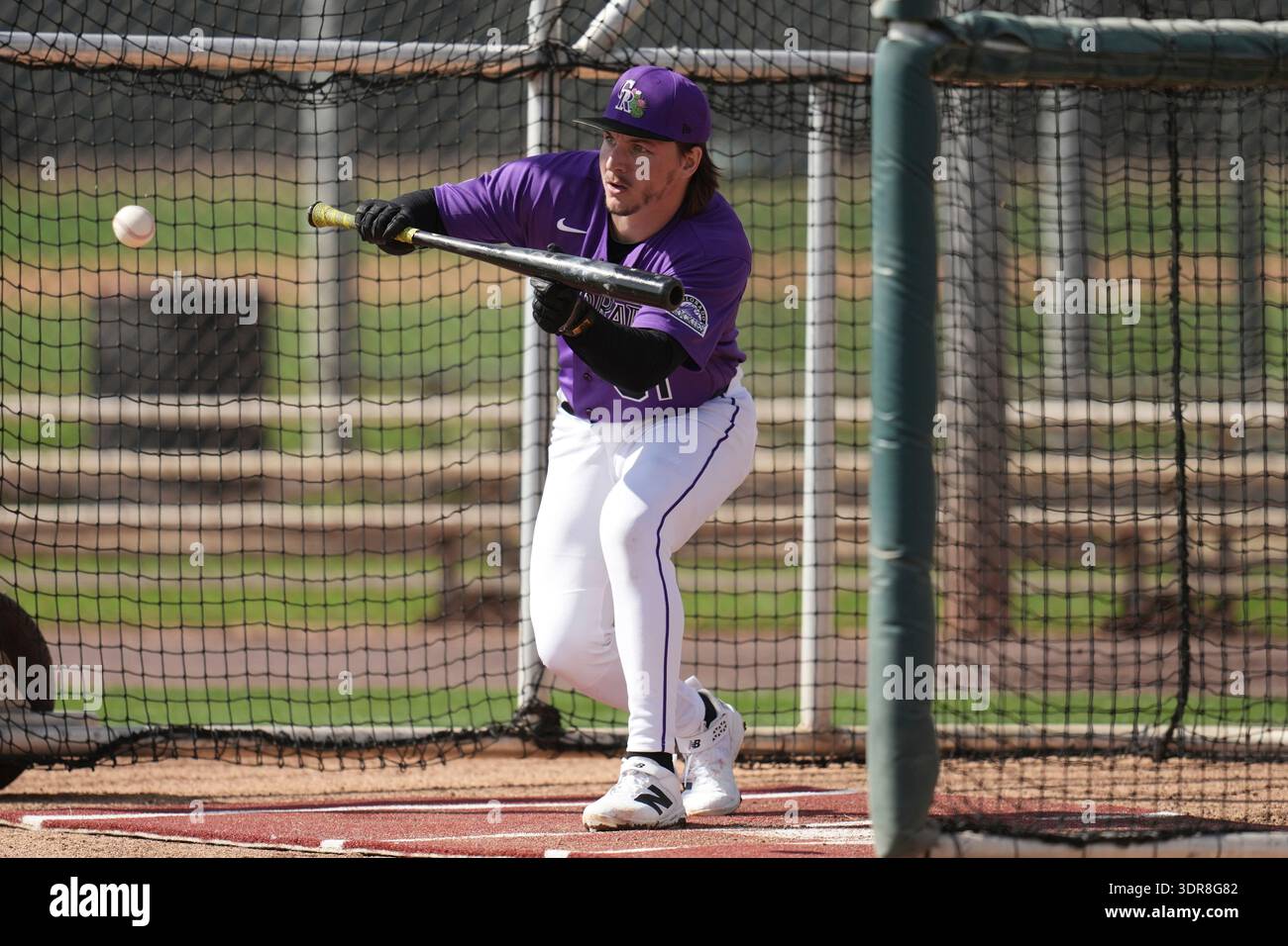 Colorado Rockies' Jake McCarthy works out during spring training ...