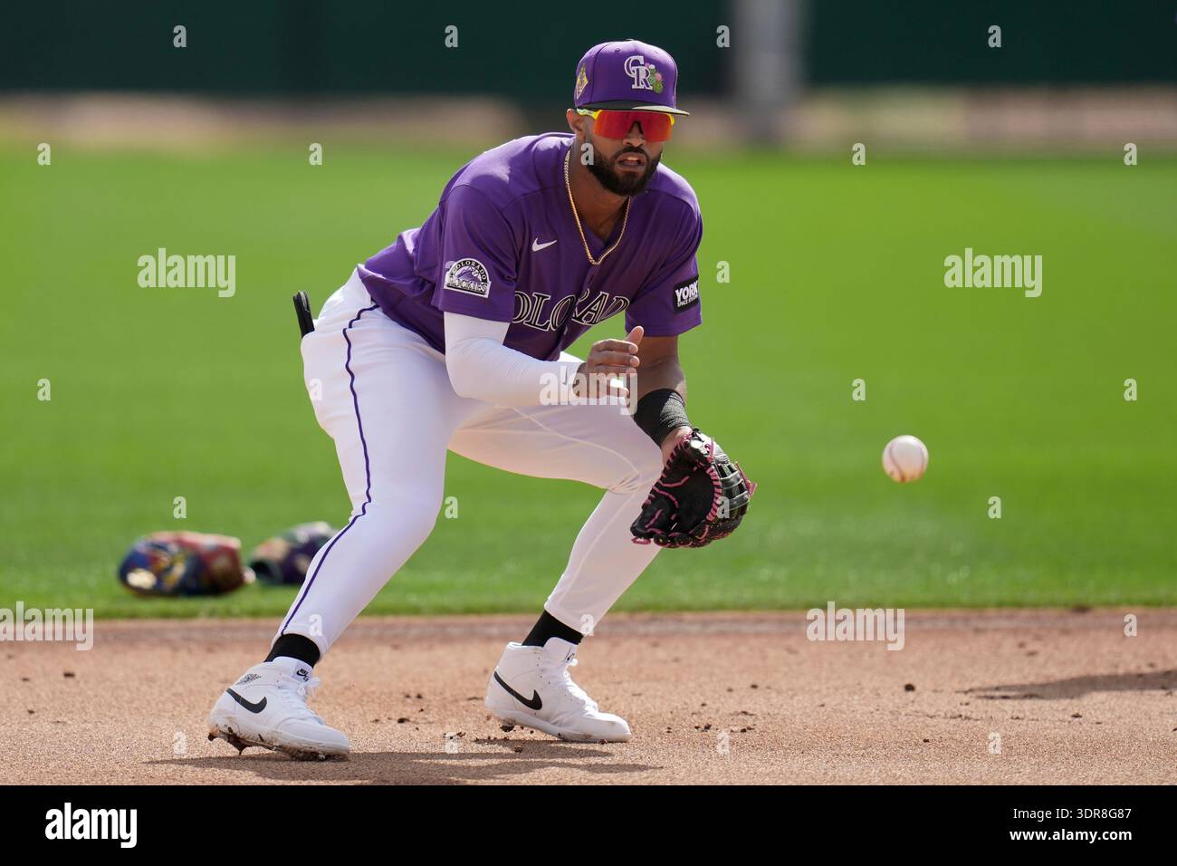 Colorado Rockies' Willi Castro works out during spring training ...
