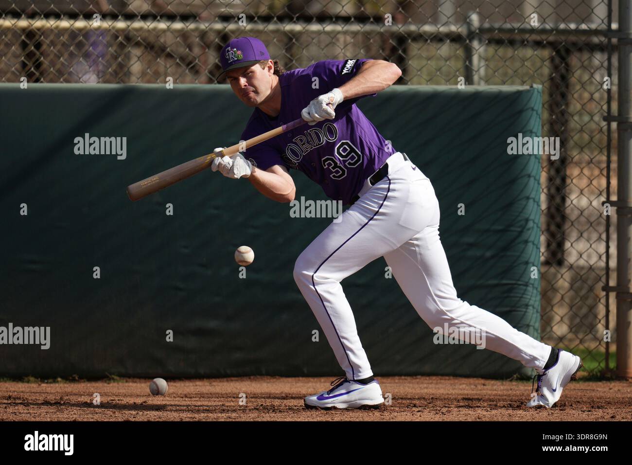 Colorado Rockies' Chad Stevens works out during spring training ...