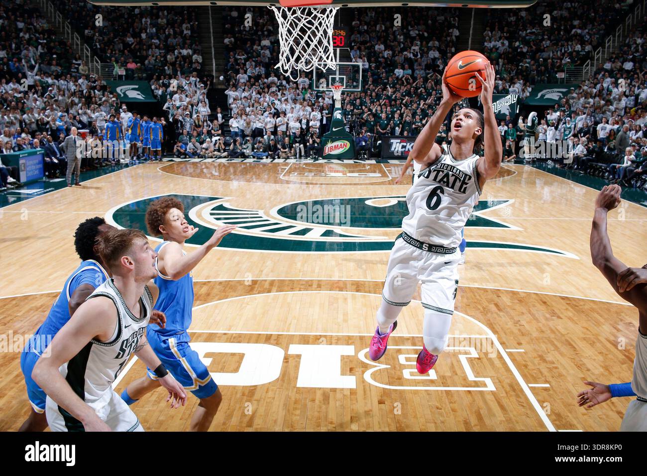 Michigan State forward Jordan Scott (6) shoots against UCLA during the ...