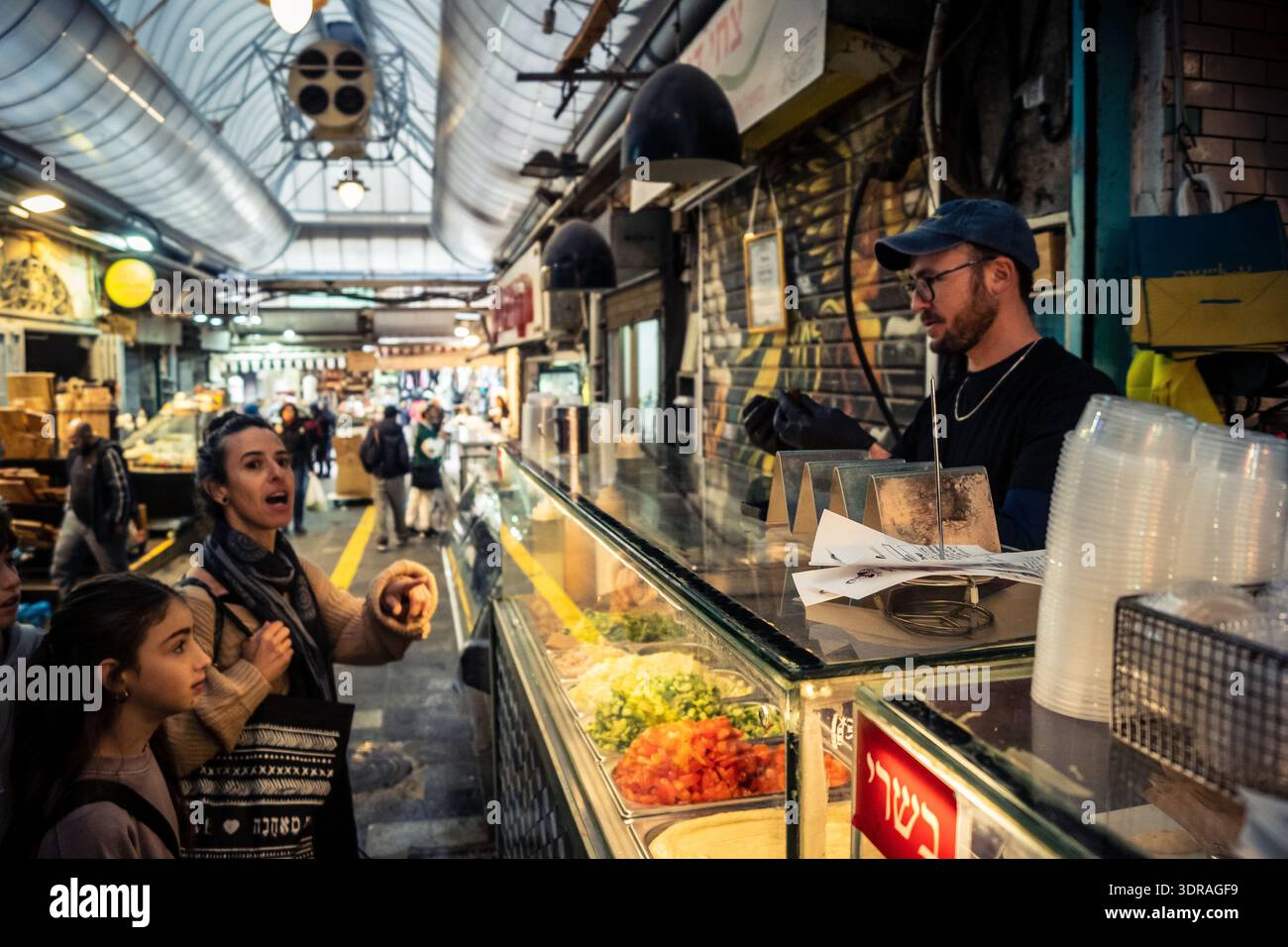 Jerusalem, Israel - February 17, 2026 The art of trade at Mahane Yehuda ...