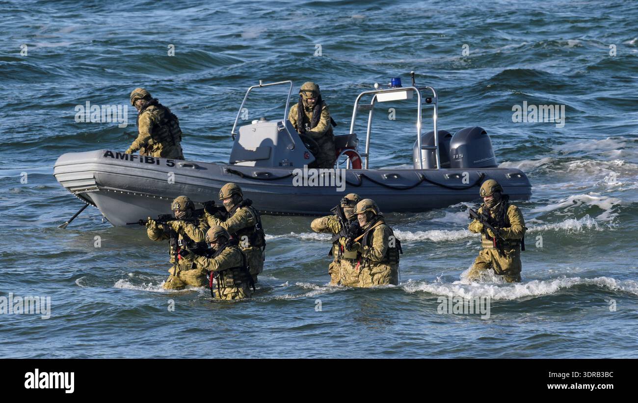 Putlos, Germany. 18th Feb, 2026. Soldiers take part in the NATO ...