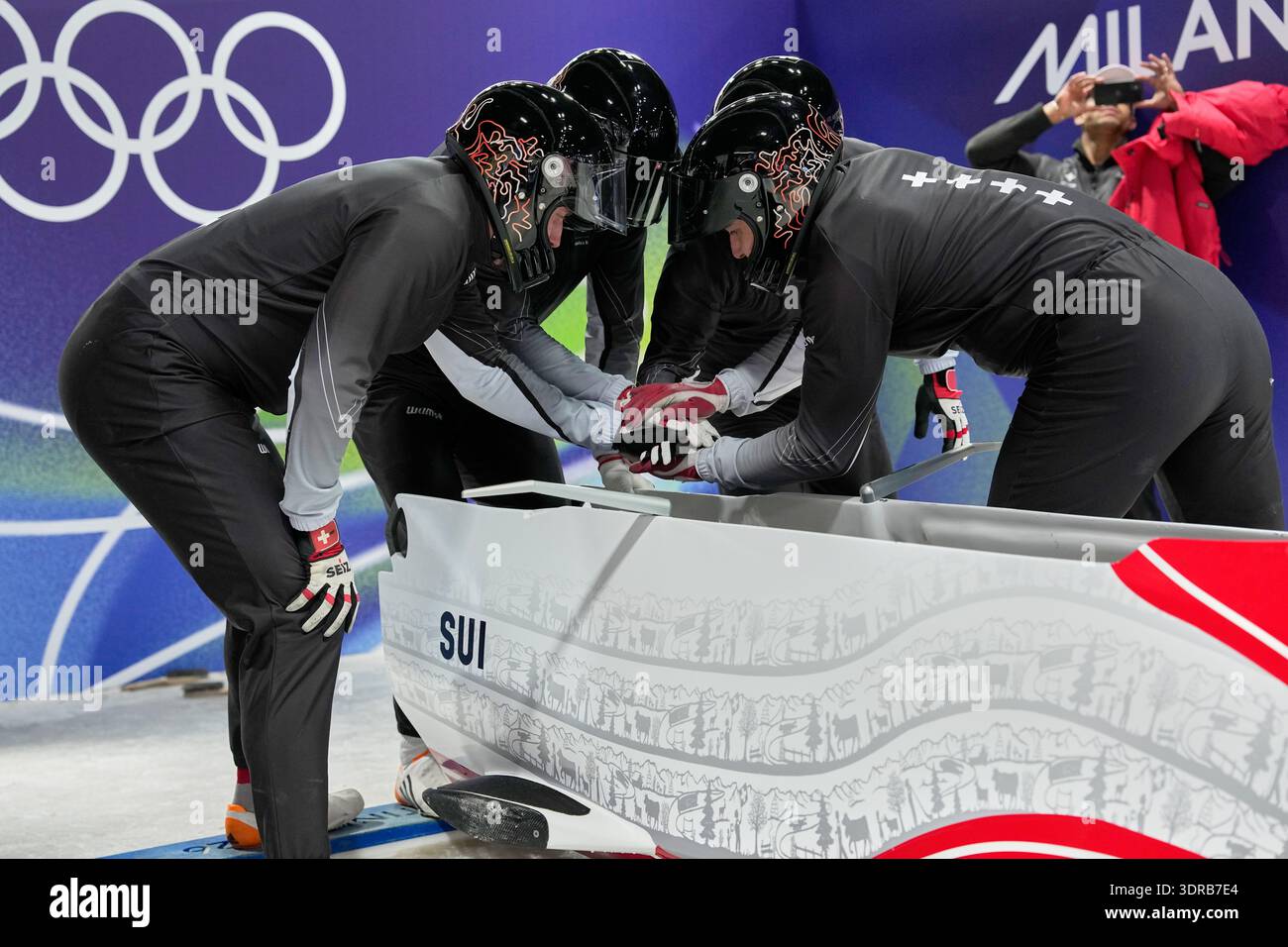 Switzerland's Timo Rohner and his team prepare to start for a four man ...