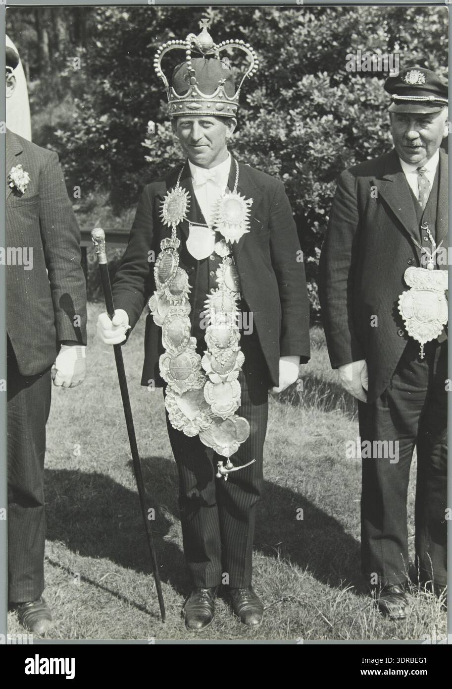 This photograph depicts the king of a shooters' guild in full regalia ...