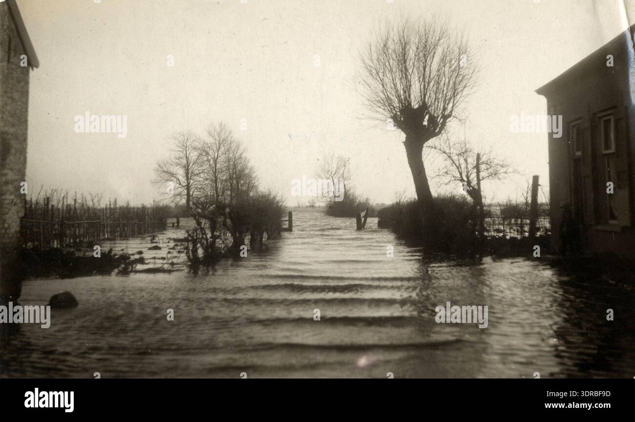 This photograph depicts severe flooding in a village in gelderland hi ...