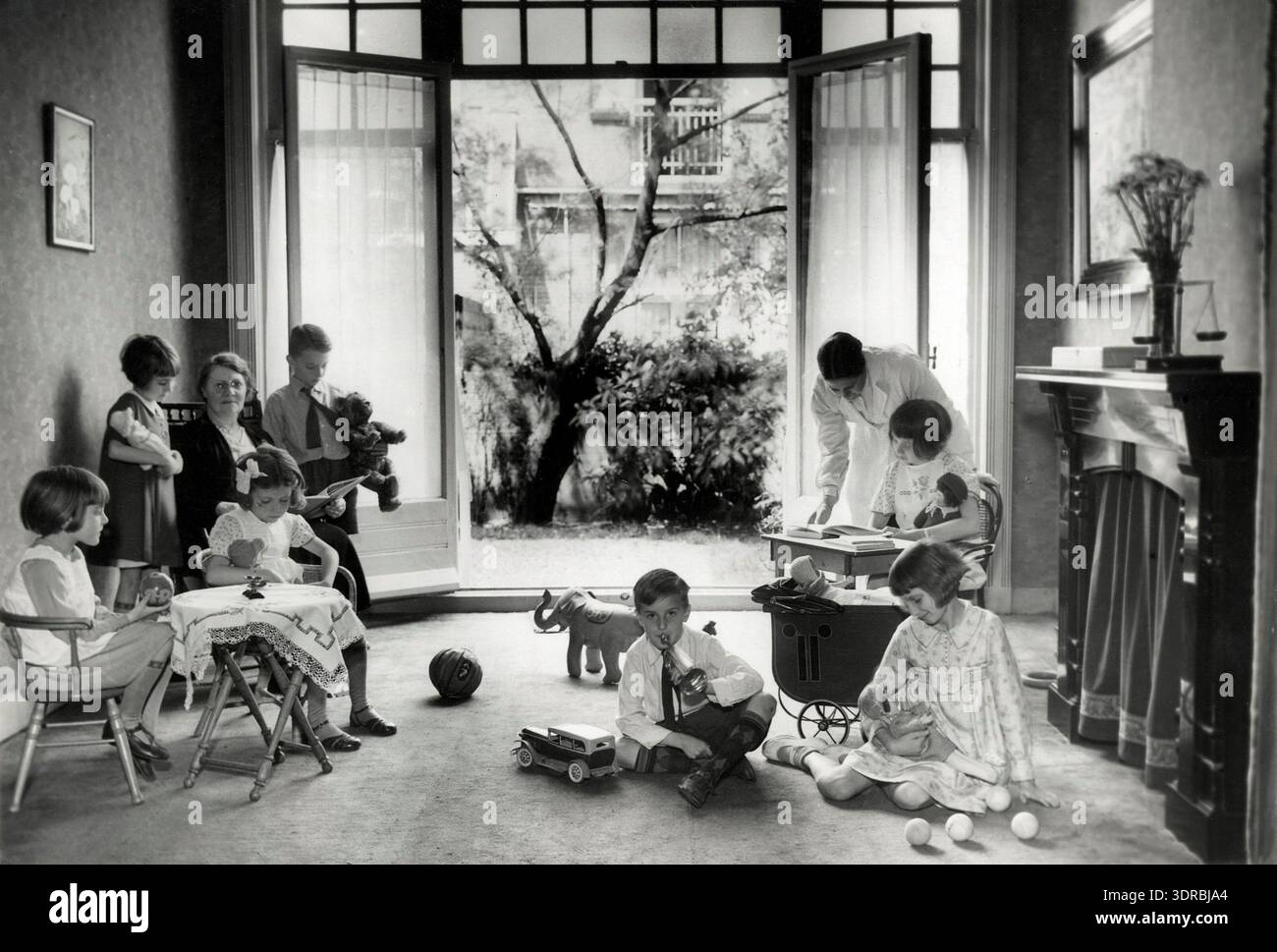 This 1935 photograph by kees hofker depicts children playing in hi-res ...