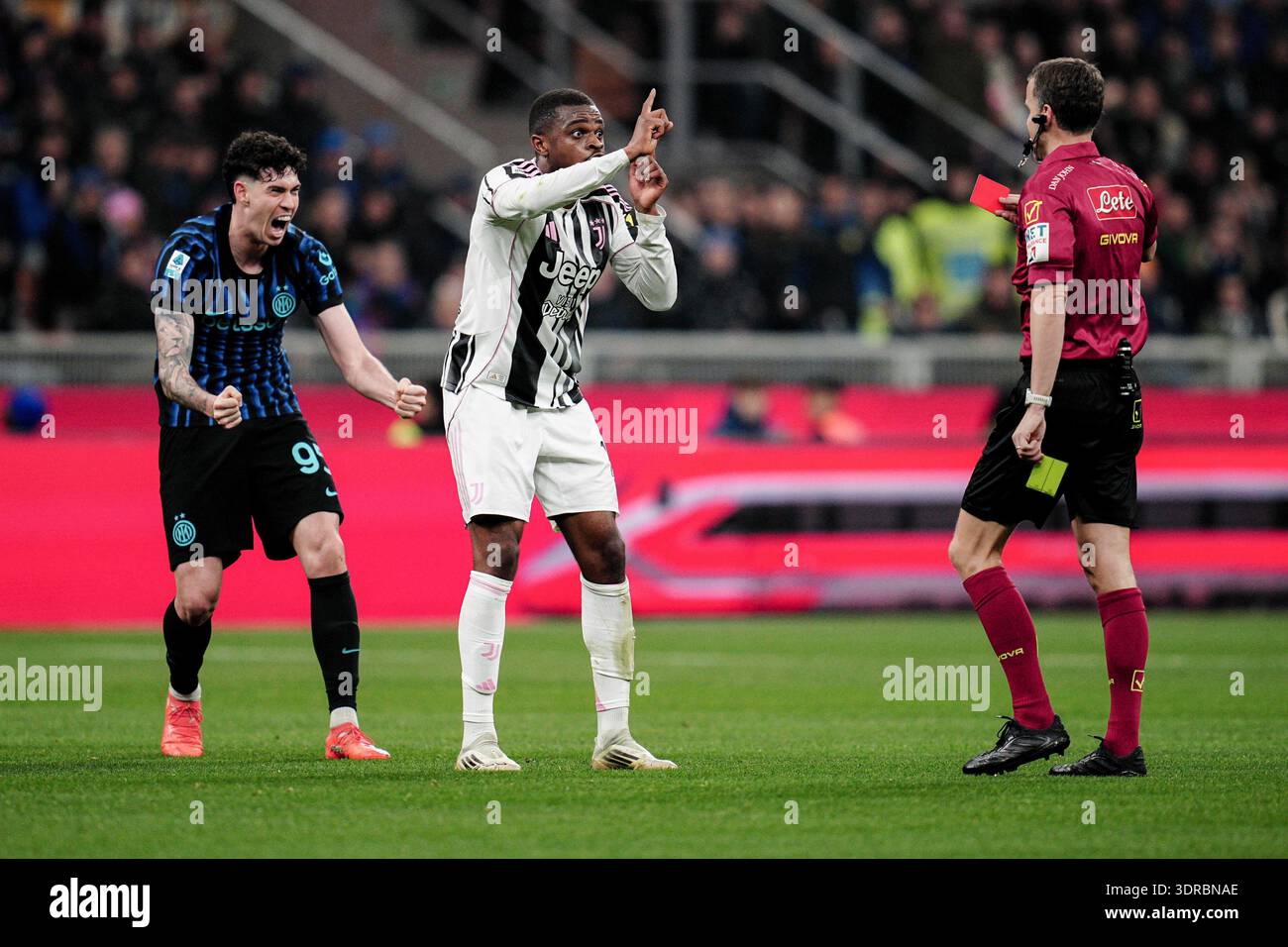 Juventus' Pierre Kalulu reacts after getting a red card during the ...