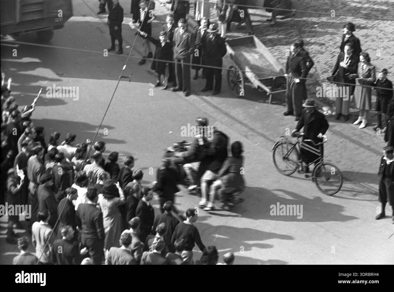 The dam in amsterdam is filled with crowds in th hi-res stock ...