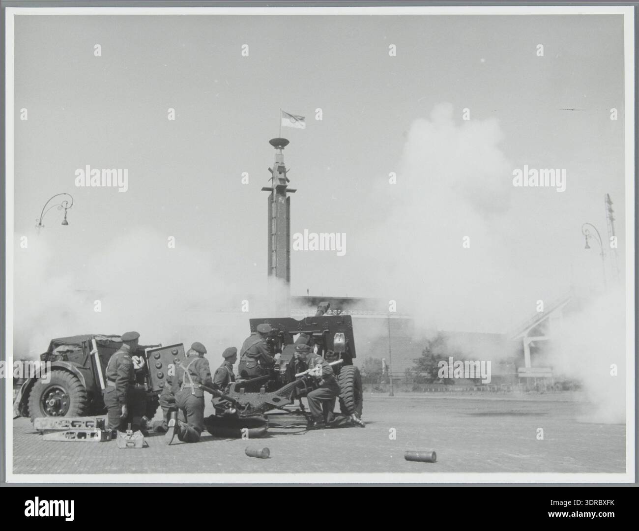 The photograph depicts a live artillery fire demonstration by th hi-res ...