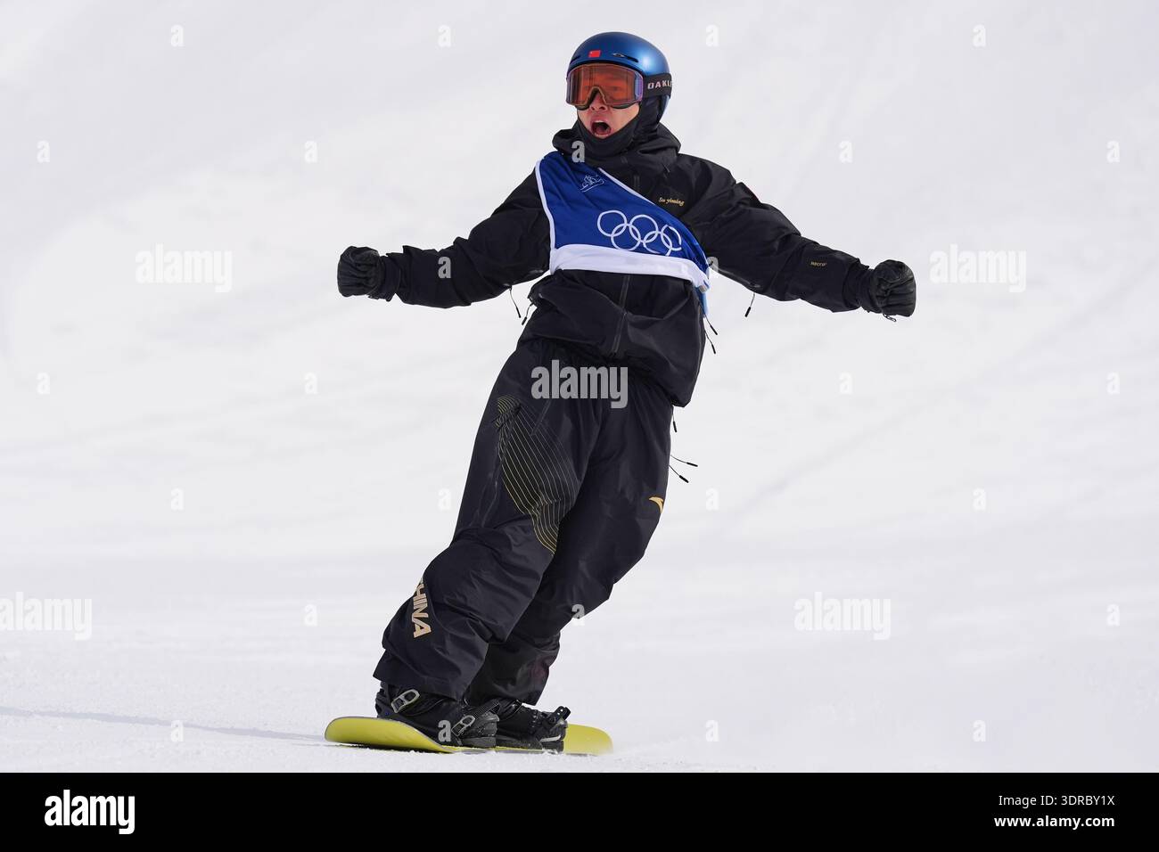 China's Su Yiming celebrates during the men's snowboarding slopestyle ...