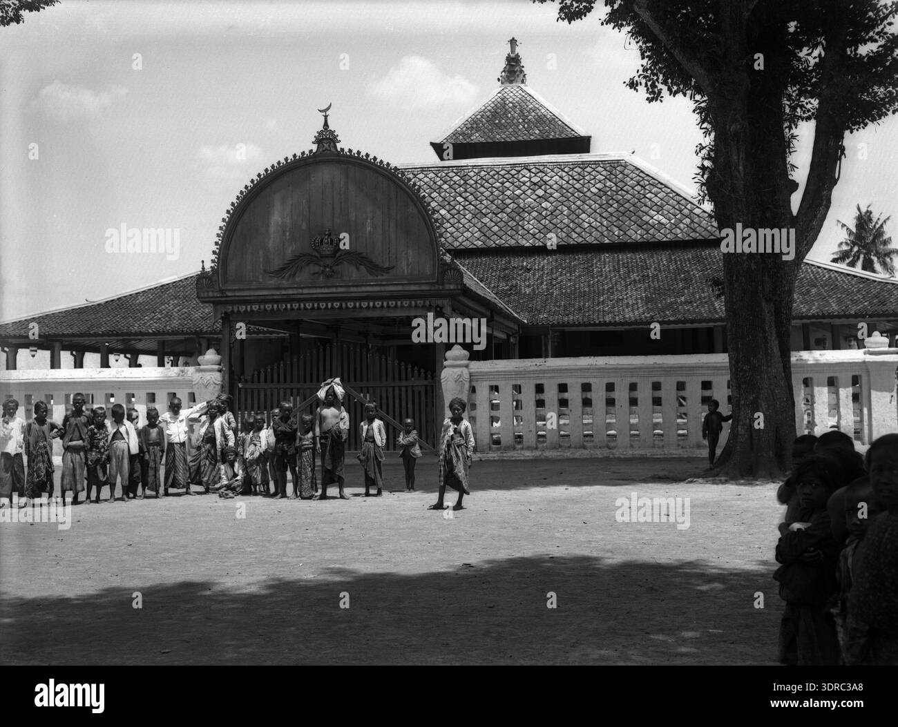 The mosque features traditional javanese architectural elements hi-res ...
