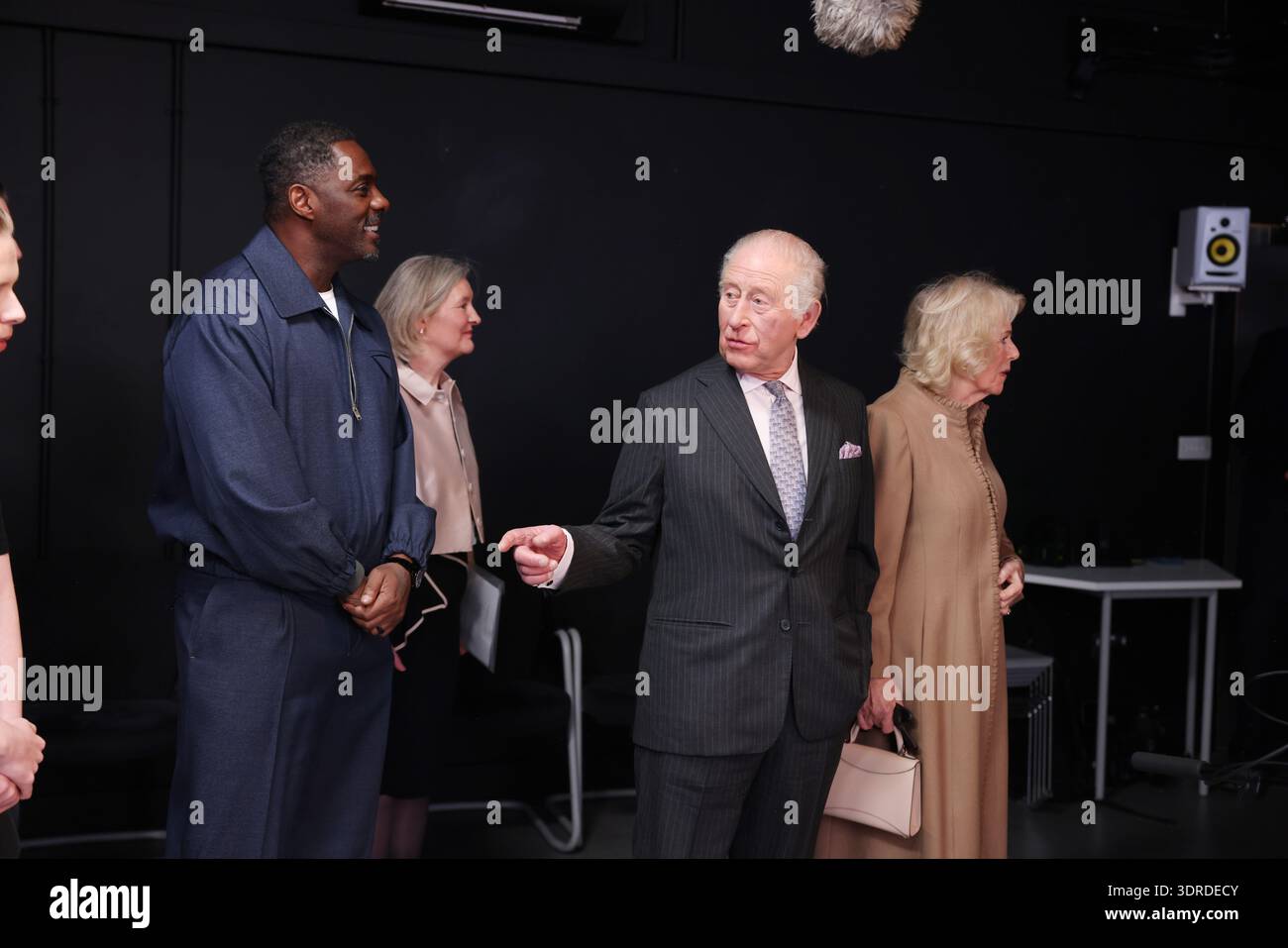 King Charles III (second right) and Queen Camilla (right) with Barking ...