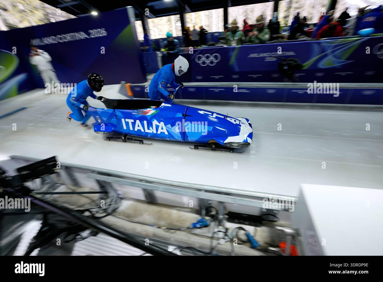 Italy's Giada Andreutti, right, starts for a two women bobsled training ...