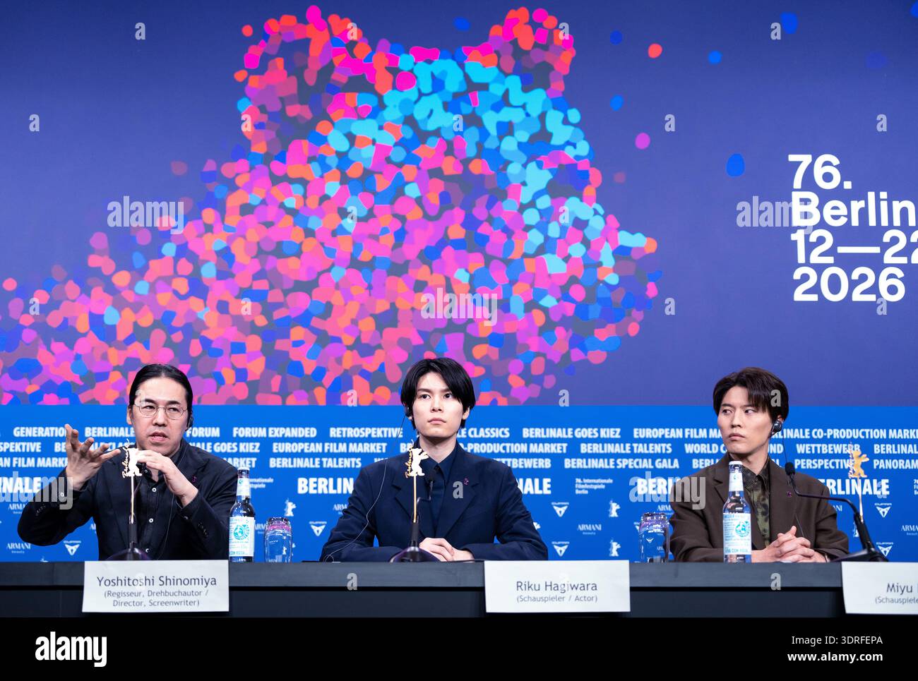 18 February 2026, Berlin: Director Yoshitoshi Shinomiya (l) and actors ...