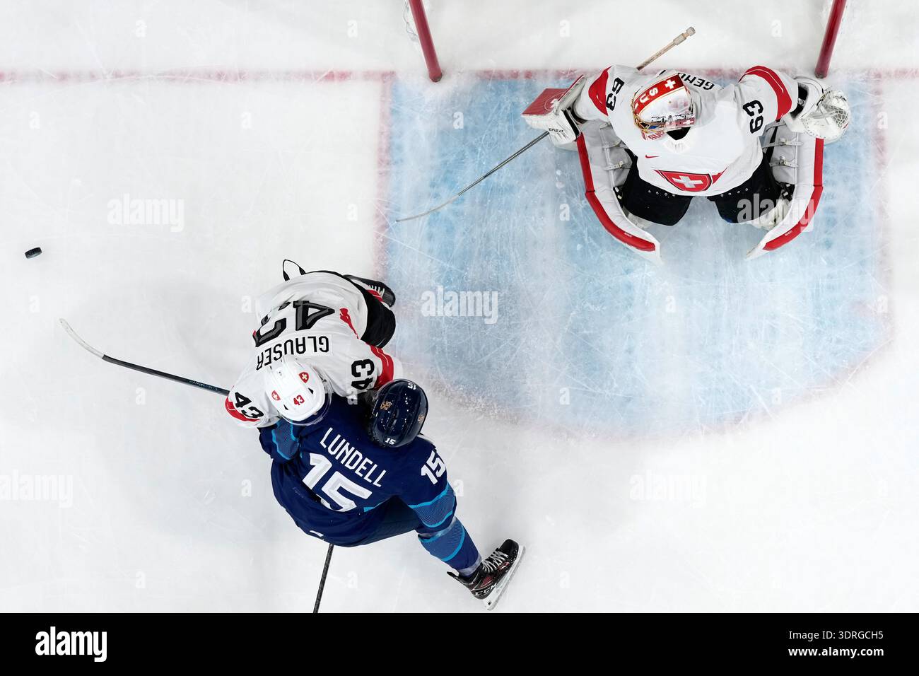 Switzerland's Andrea Glauser (43) challenges with Finland's Anton ...