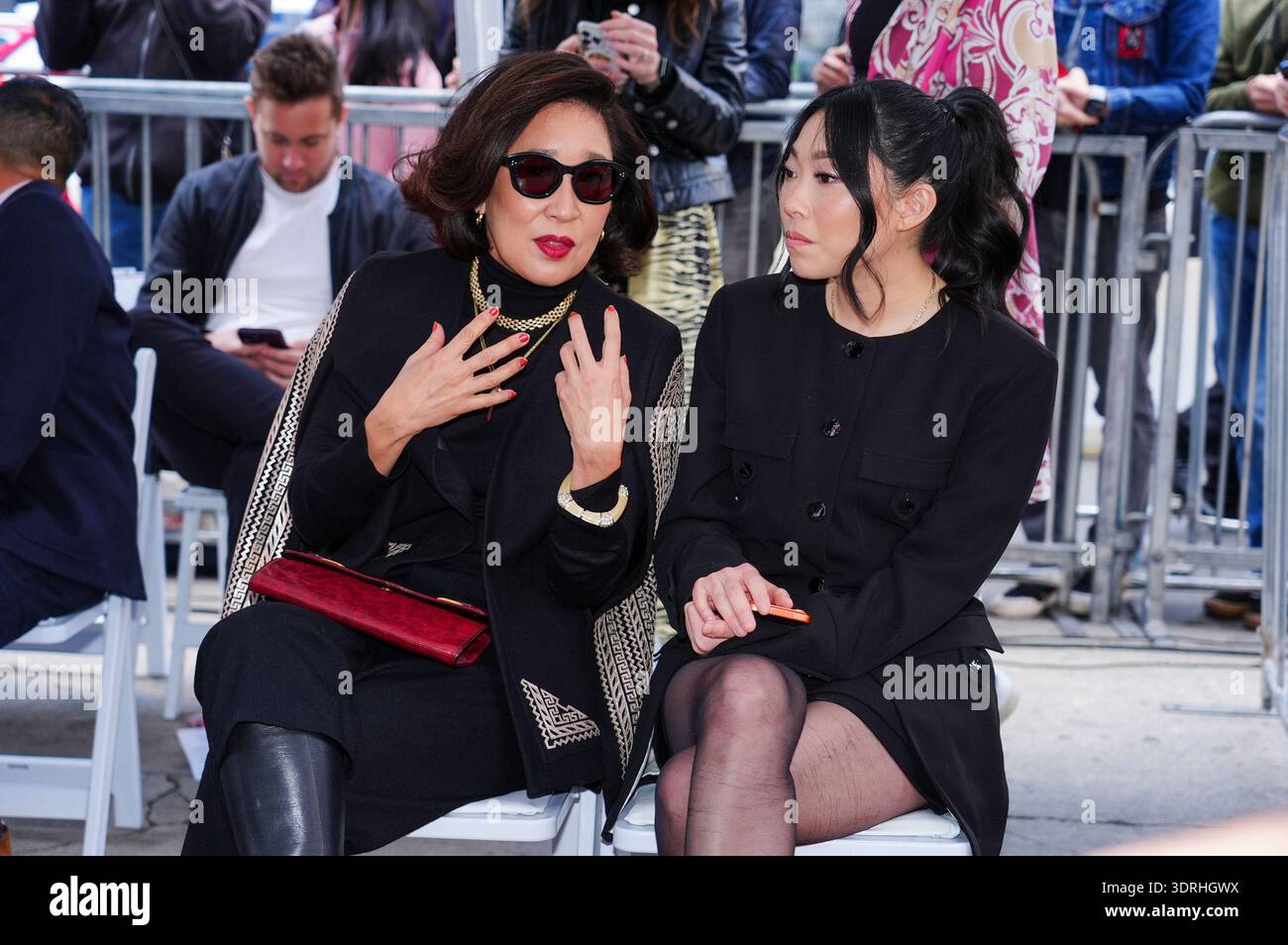 Sandra Oh, left, and Awkwafina attend a ceremony honoring Michelle Yeoh ...
