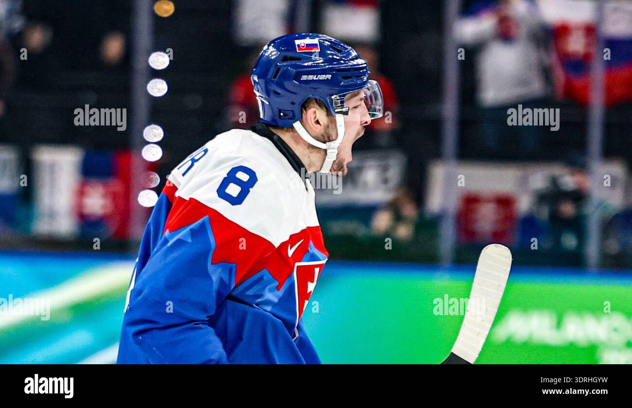 260218 -- MILAN, Feb. 18, 2026 -- Oliver Okuliar of Slovakia celebrates ...