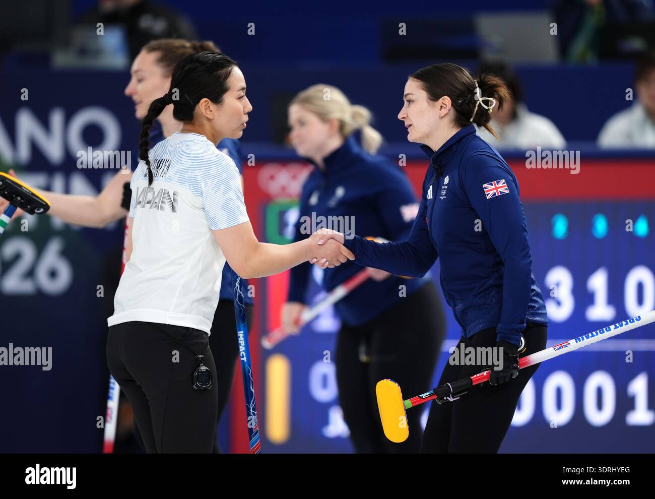 Japan's Anna Ohmiya greets Great Britain's Rebecca Morrison following ...