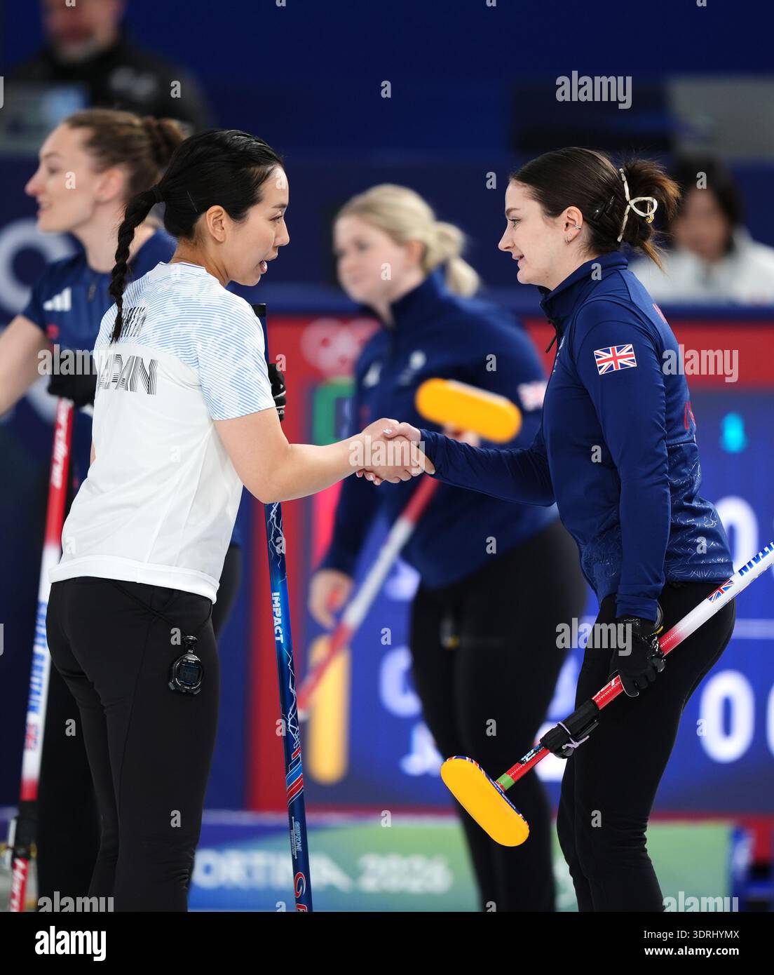 Japan's Anna Ohmiya greets Great Britain's Rebecca Morrison following ...