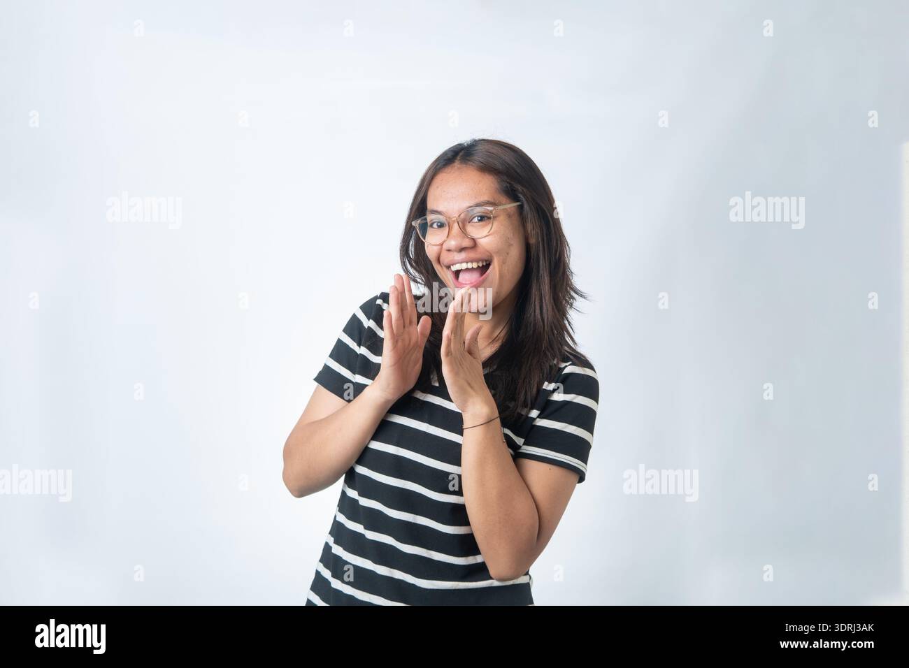 Portrait excited young woman clapping hi-res stock photography and ...