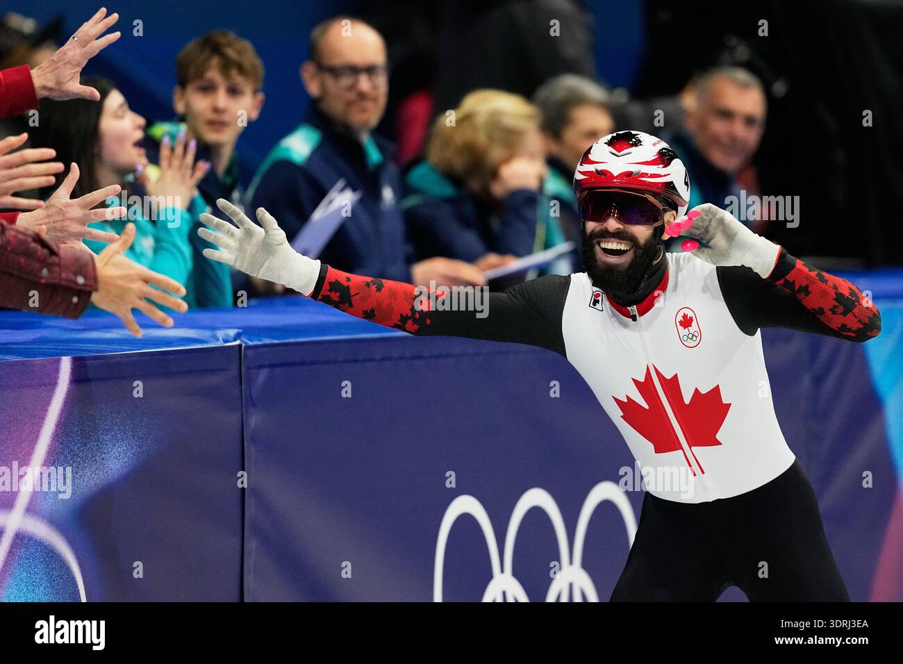 Steven Dubois of Canada wins gold during the short track speed skating ...