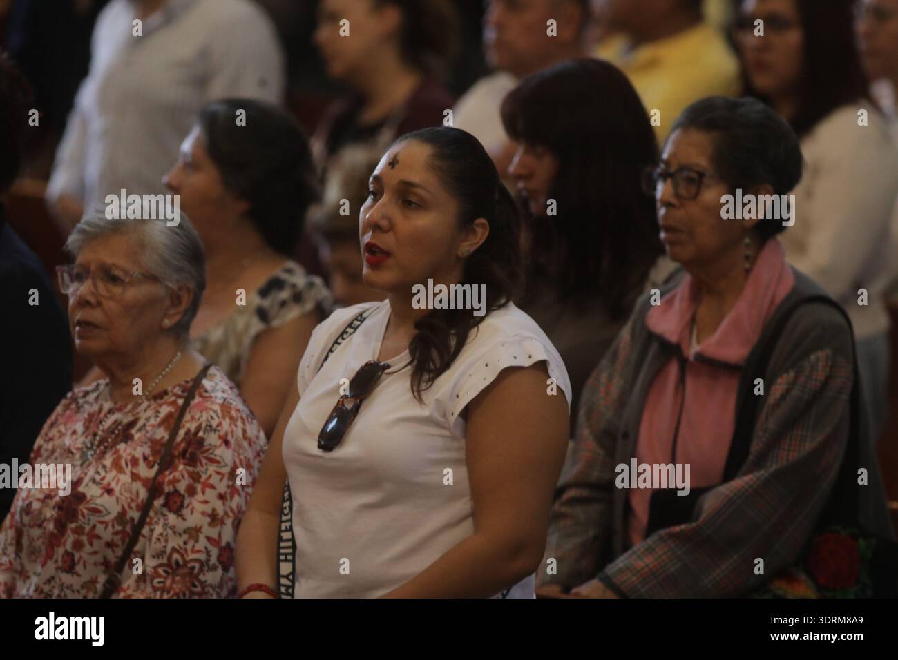Faithfuls are seen during a mass for the Ash Wednesday liturgical ...