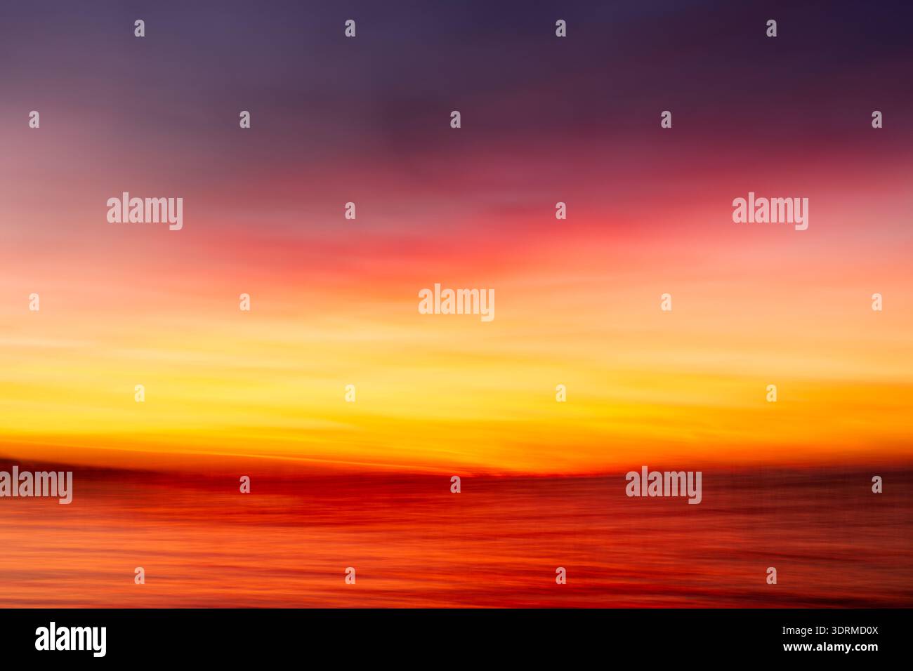 Abstract, camera motion blur photograph of sunset at Upper Red Lake ...