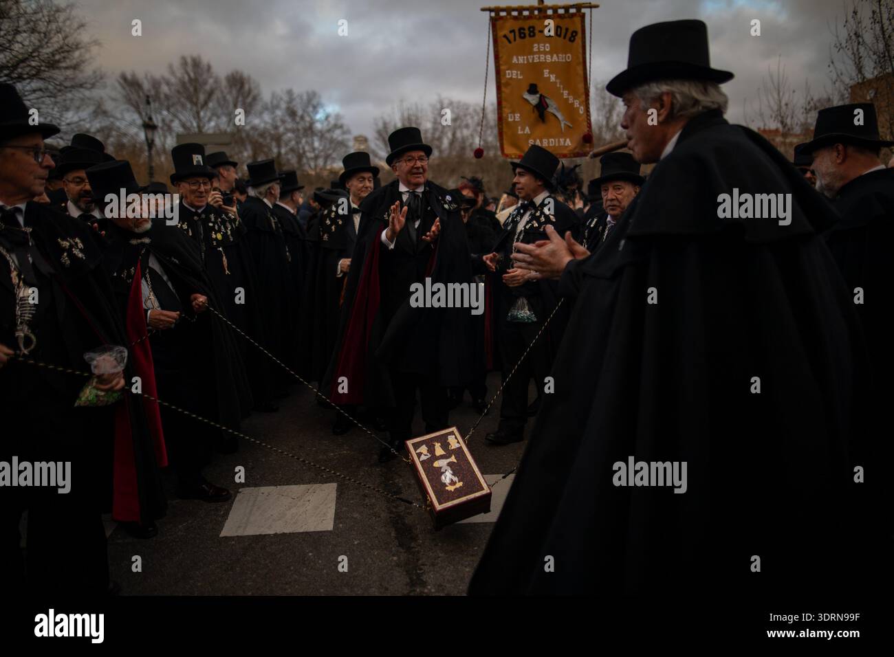Members of the Merry Brotherhood of the Burial of the Sardine carry a ...