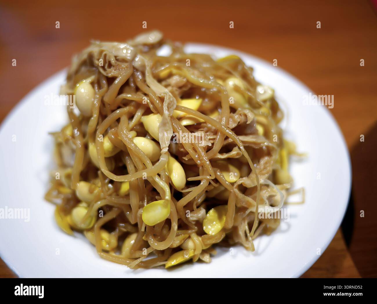 Taiwanese stir fried soybean sprouts mixed with soft bean curd skin ...