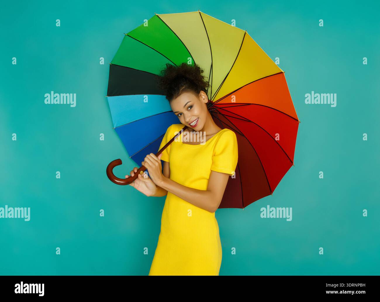 Bright umbrella multiple colors hi-res stock photography and images - Alamy