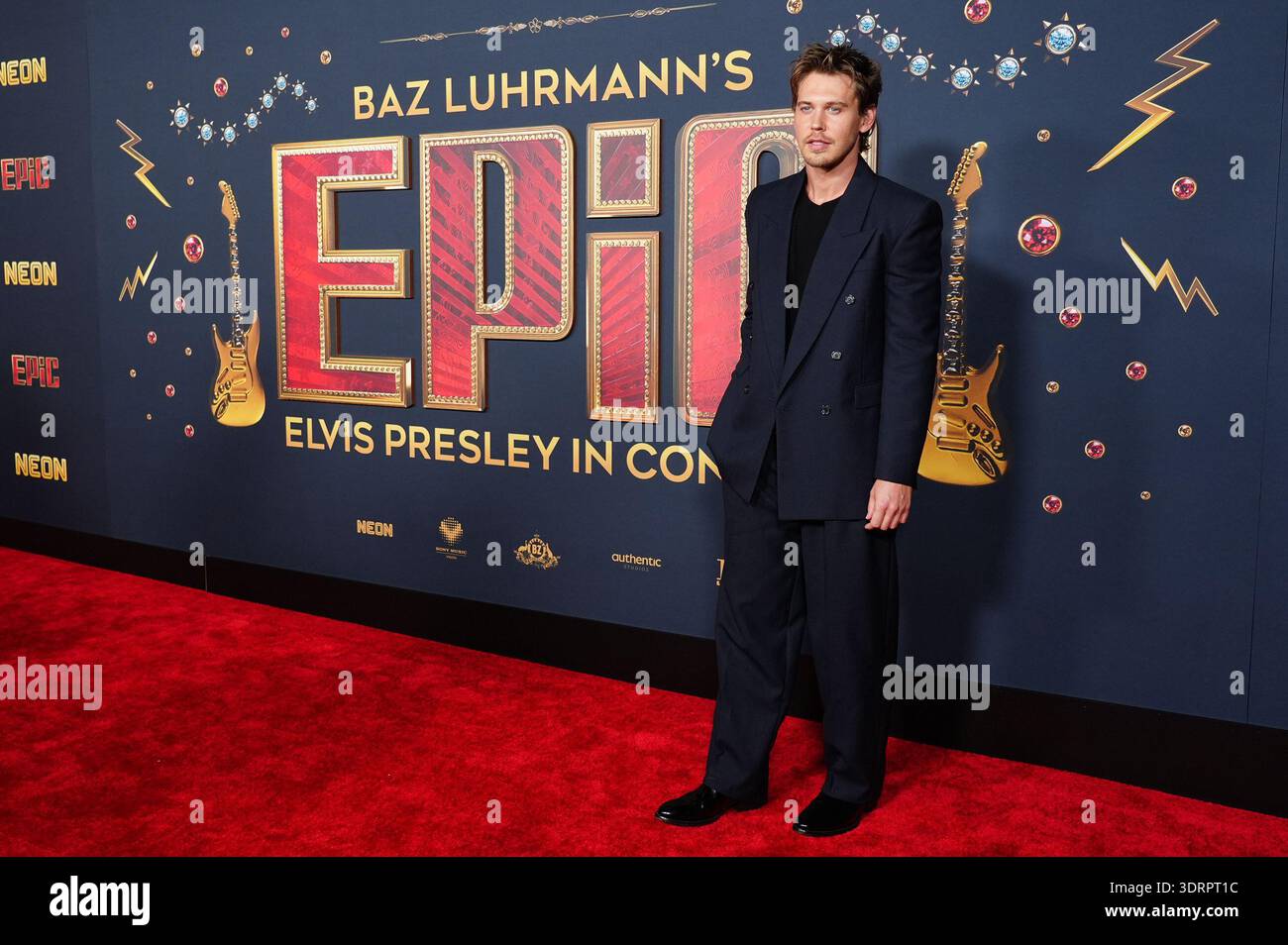 Austin Butler arrives at the premiere of "EPiC: Elvis Presley in ...