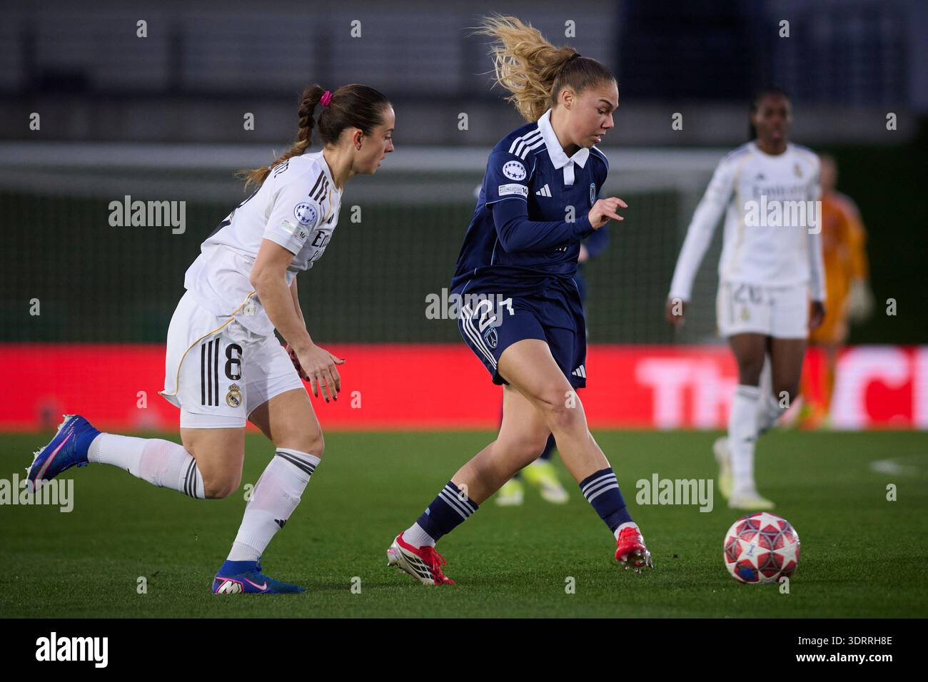 Real Madrid's Sara Dabritz (L) and Paris FC’s Oceane Picard during ...